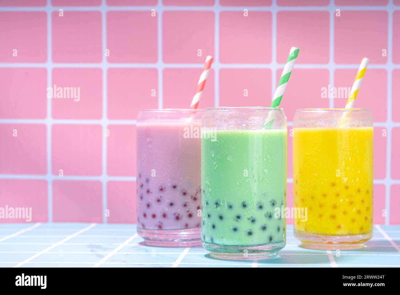 Set of three colorful summer bubble tea, bright creamy pearl tea or ...
