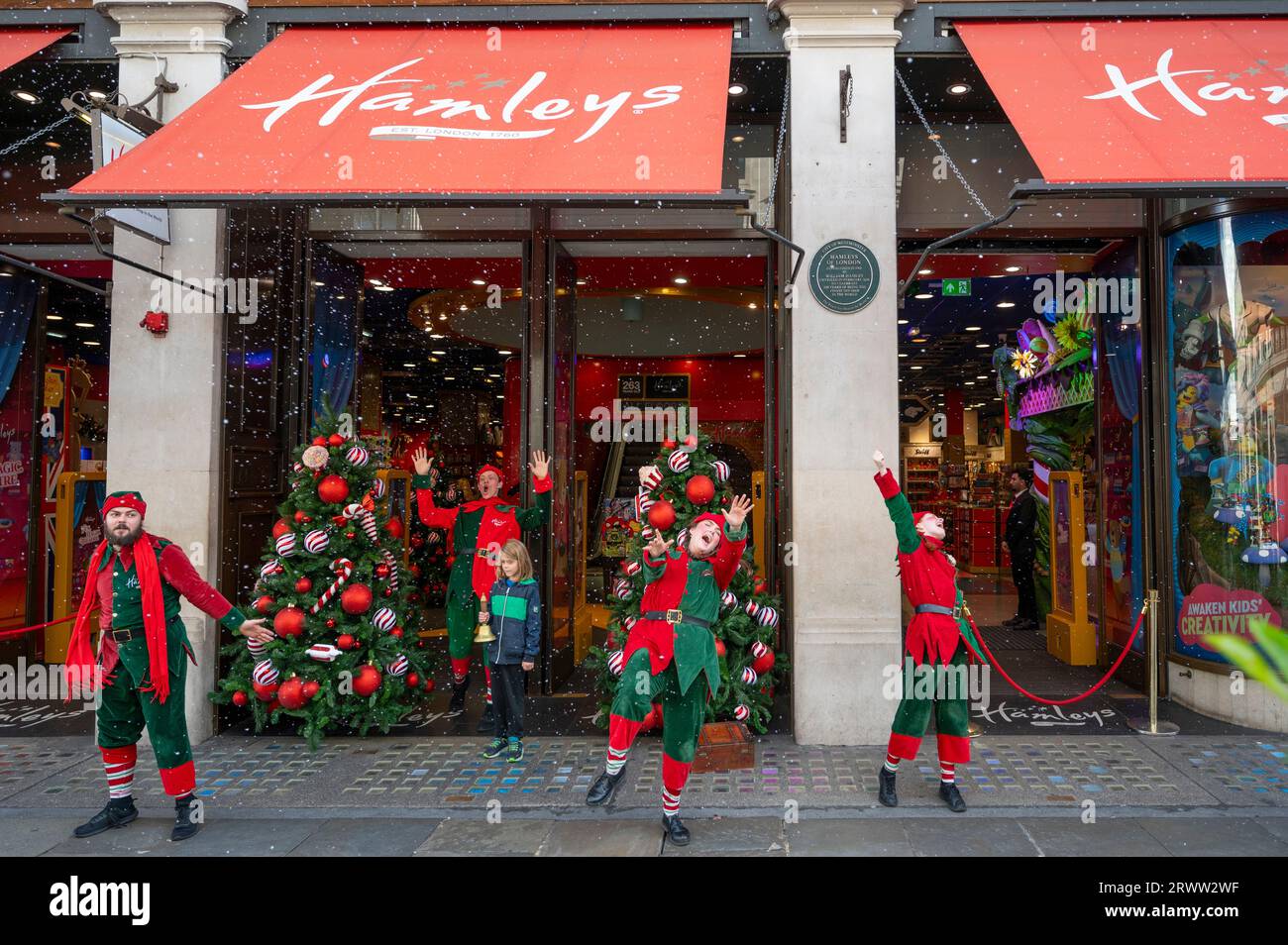 Regent Street, London, UK. 21st Sep, 2023. Hamleys Toy Store elves welcome early morning ...