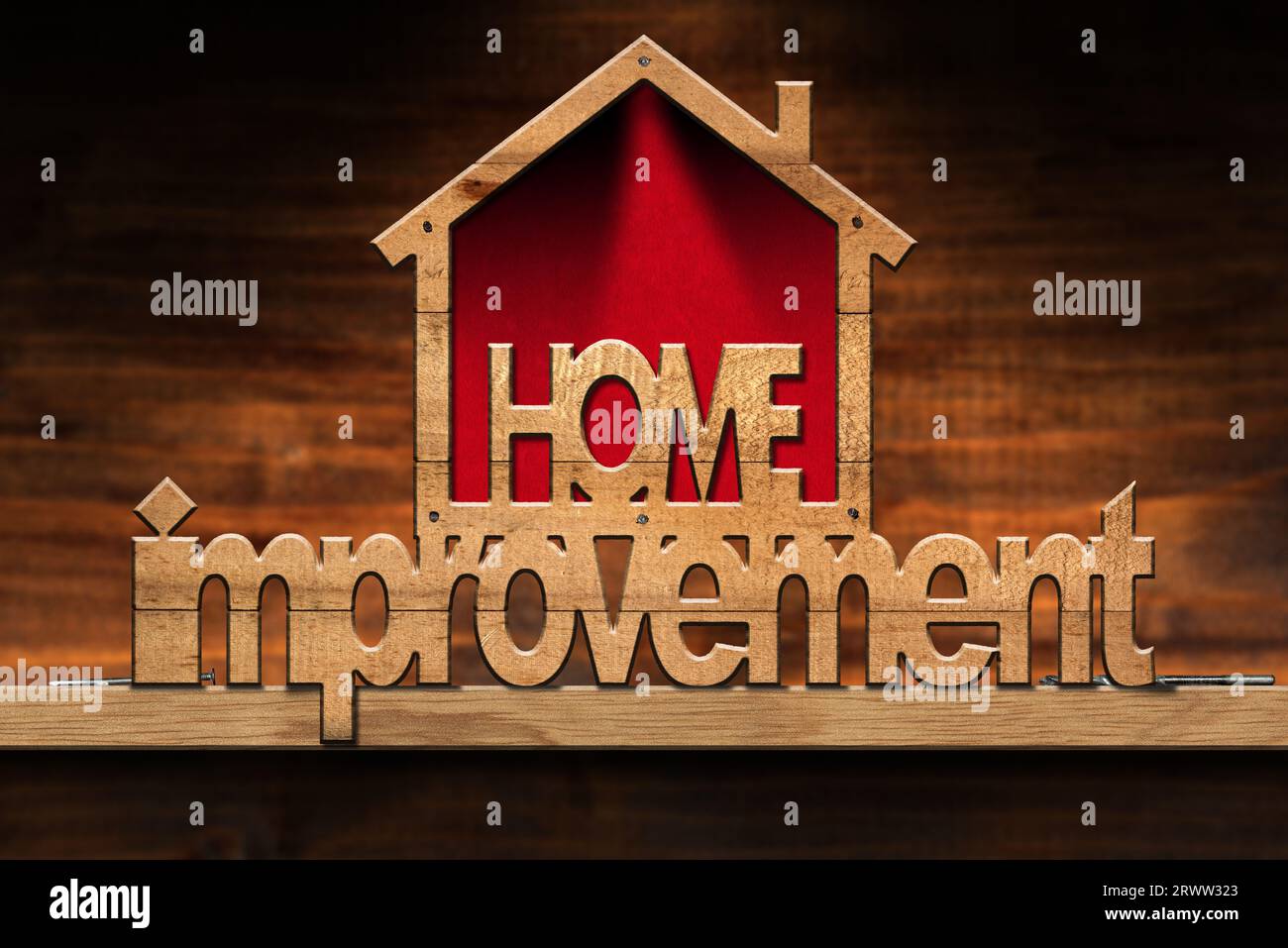 Small wooden model house with text home improvement on a workbench and ...