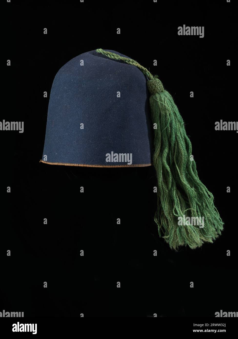 Blue felt Zouave fez with green tassel. AF*24937.04 Stock Photo - Alamy