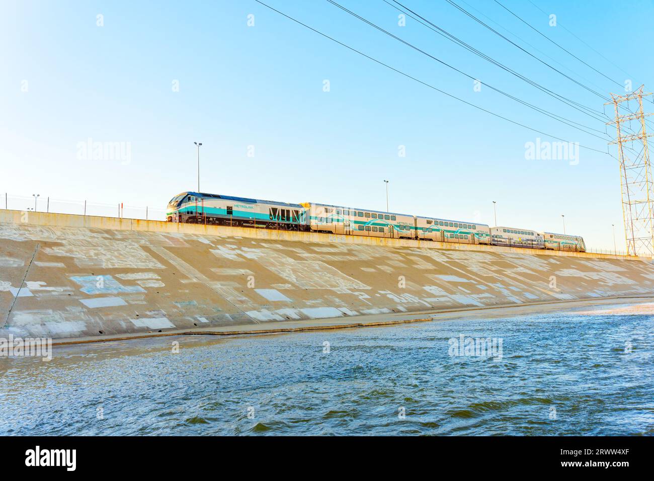 Train gracefully gliding along the LA River in the iconic 6th Street ...