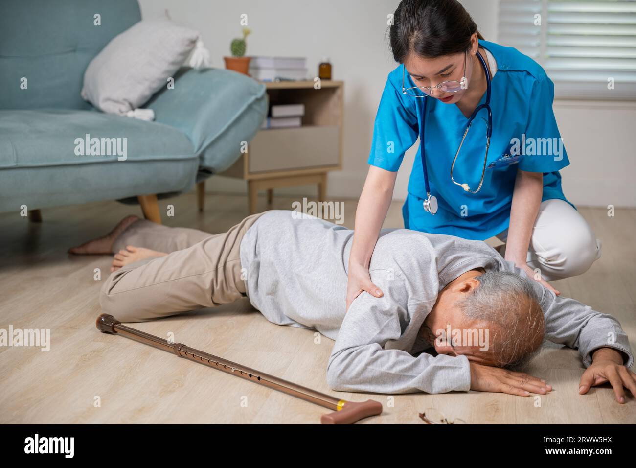 Disabled elderly man patient with walking stick fall on ground and ...