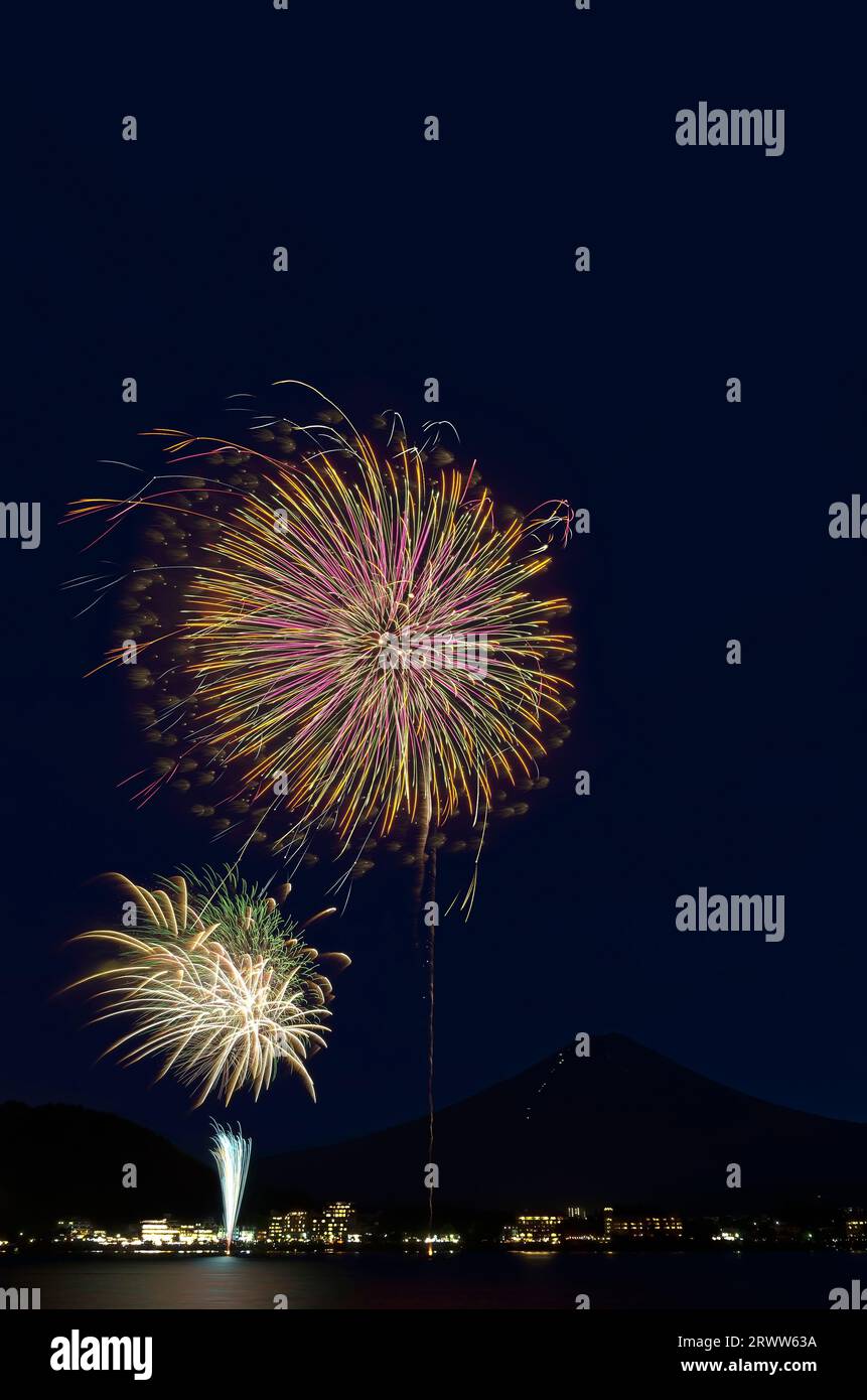 Night view of Mt. Fuji and the fireworks display at the Kawaguchiko ...