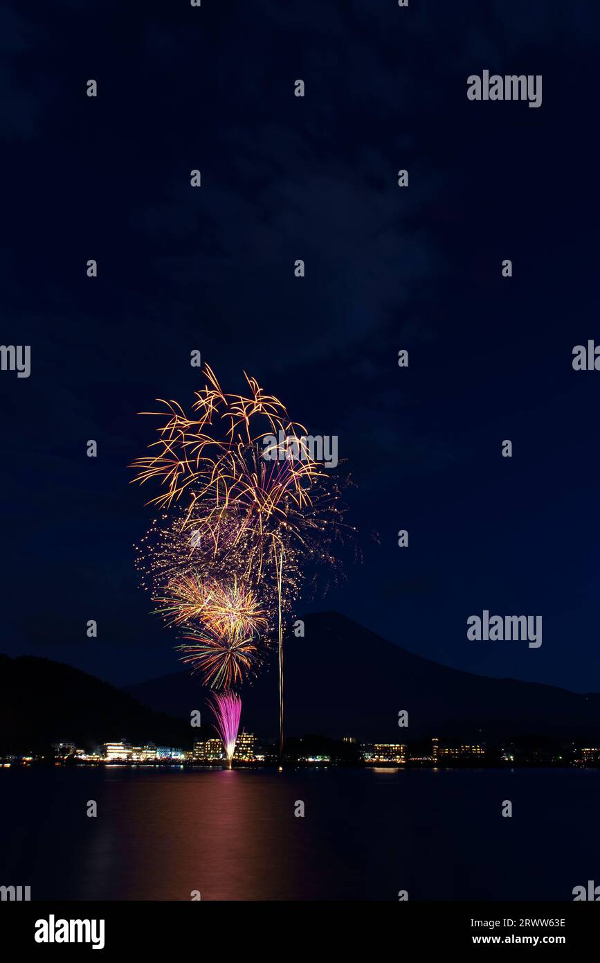 Night view of Mt. Fuji and the fireworks display at the Kawaguchiko ...