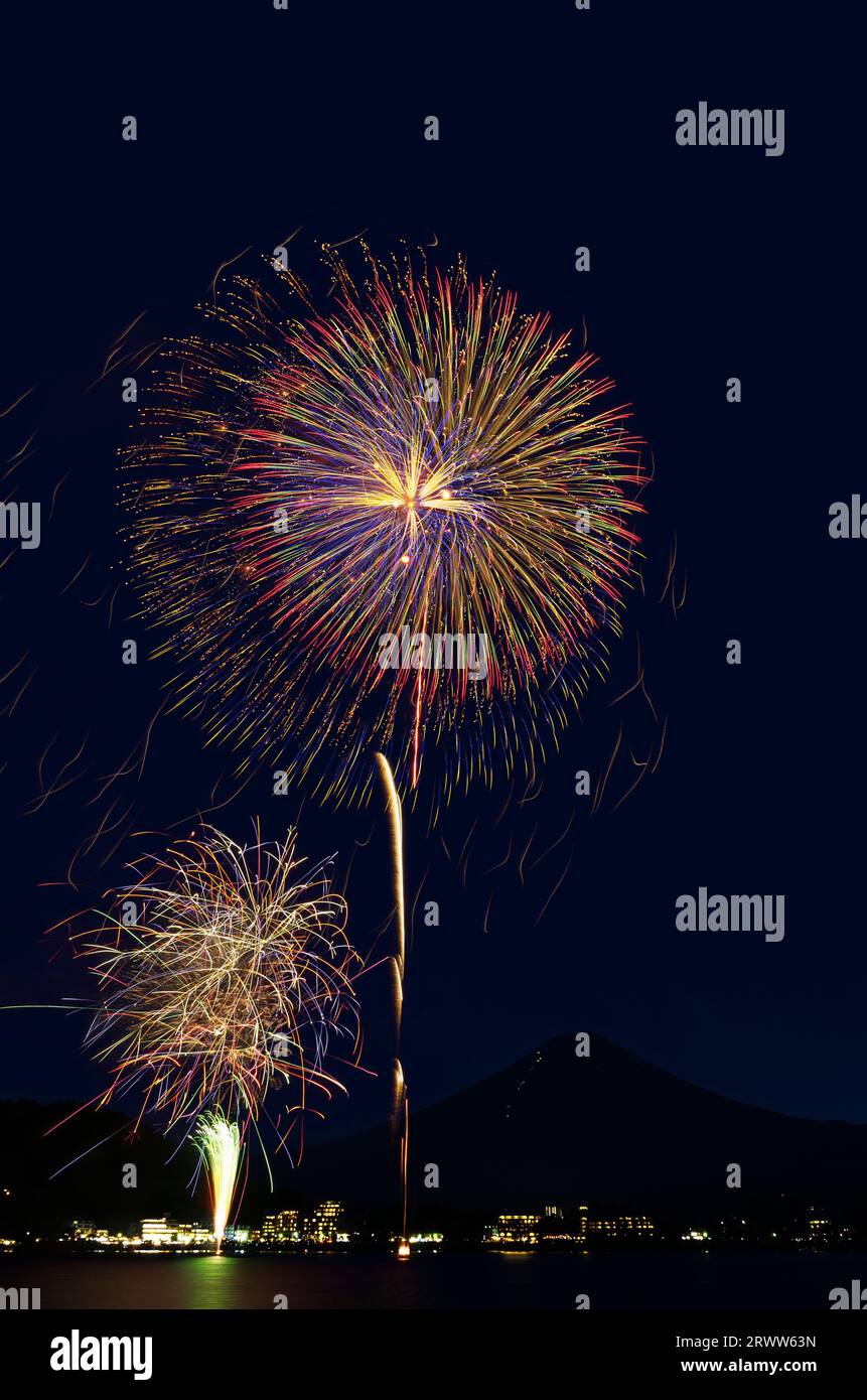 Night view of Mt. Fuji and the fireworks display at the Kawaguchiko ...