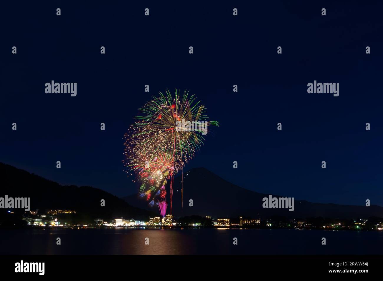 Night view of Mt. Fuji and the fireworks display at the Kawaguchiko ...