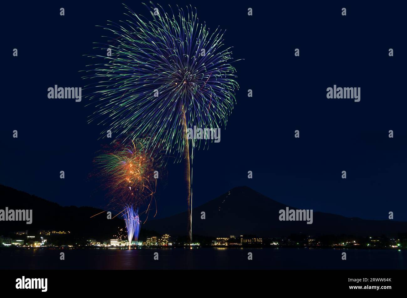 Night view of Mt. Fuji and the fireworks display at the Kawaguchiko ...