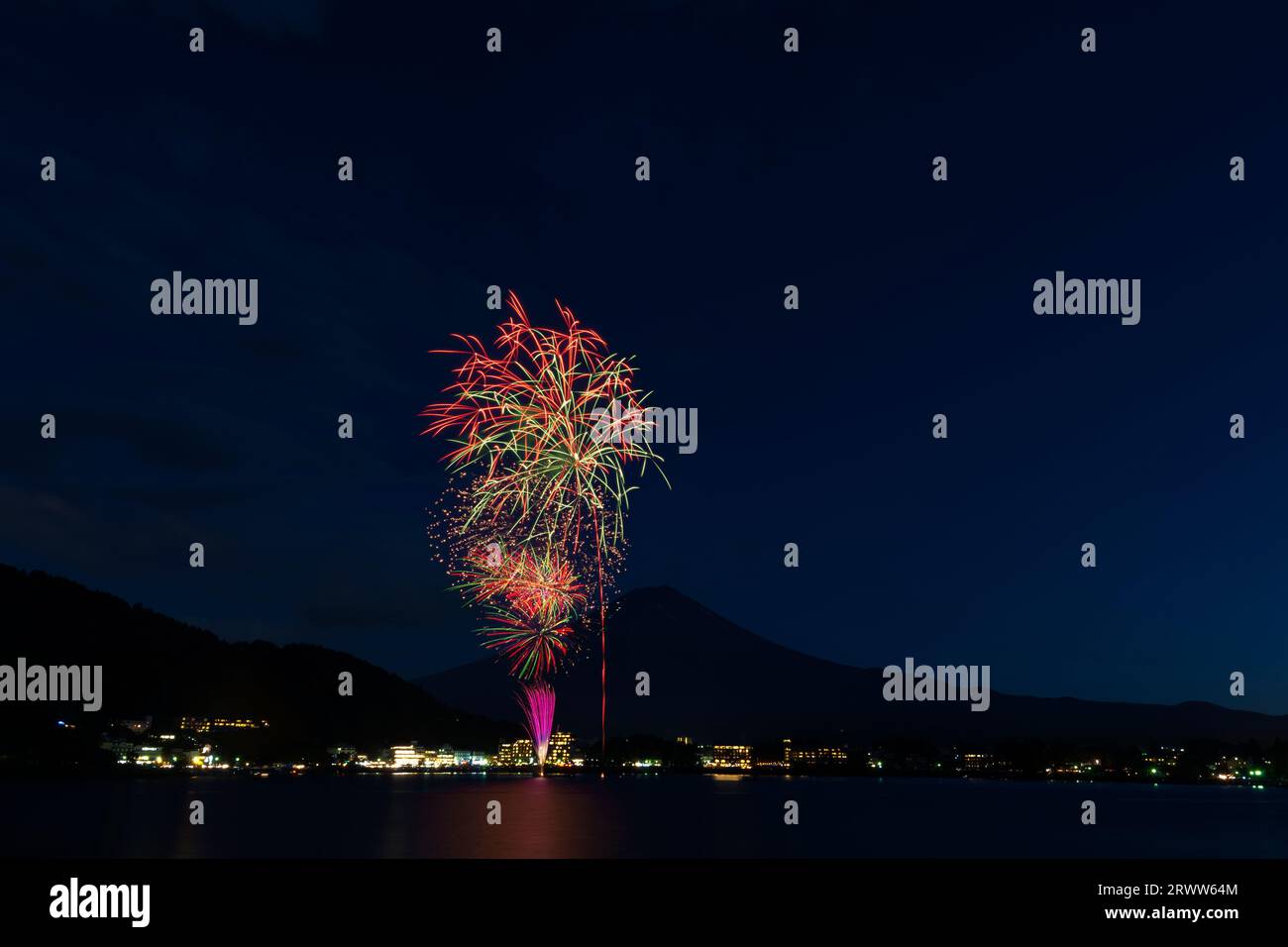 Night view of Mt. Fuji and the fireworks display at the Kawaguchiko ...