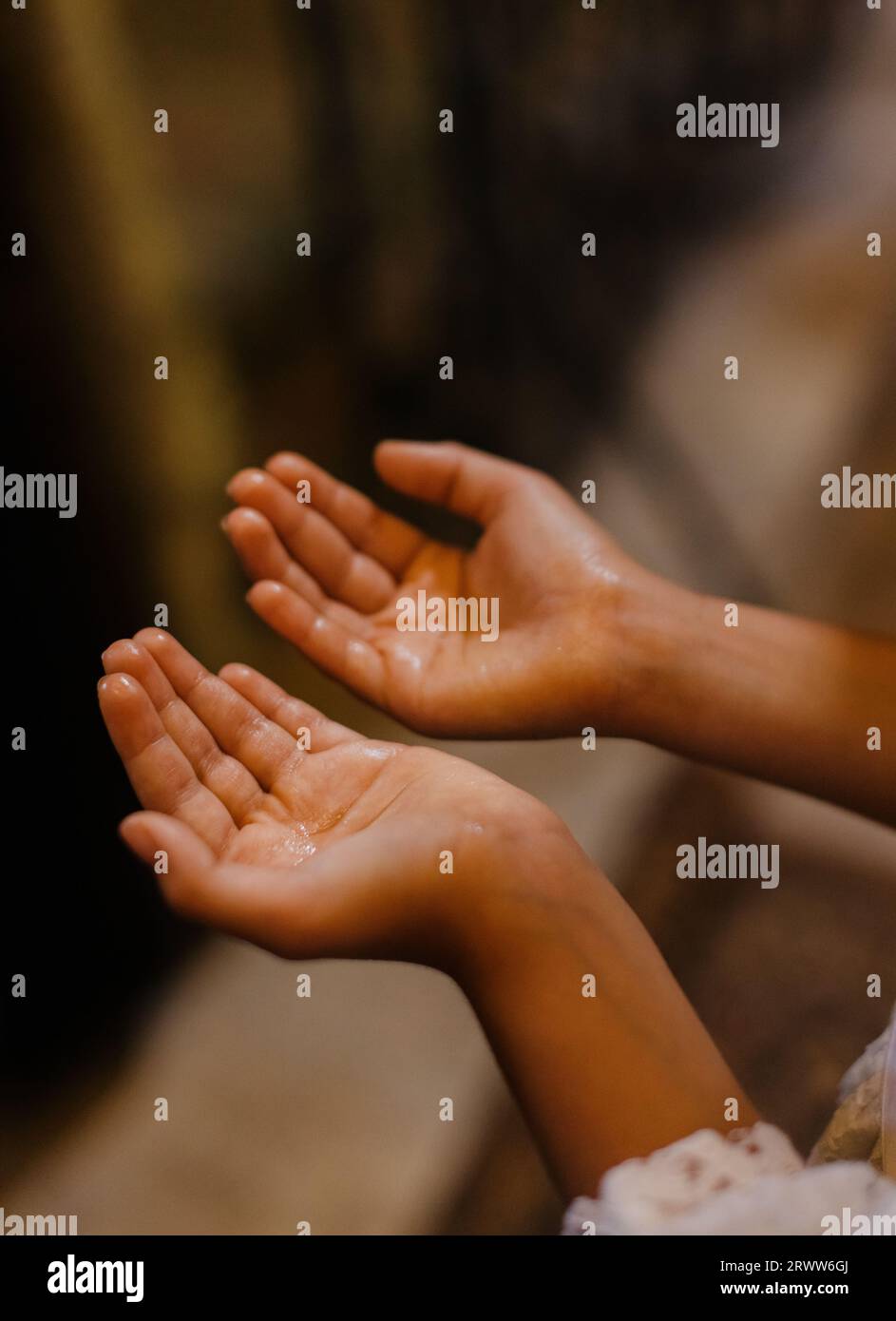 Two hands touching delicate hi-res stock photography and images - Alamy