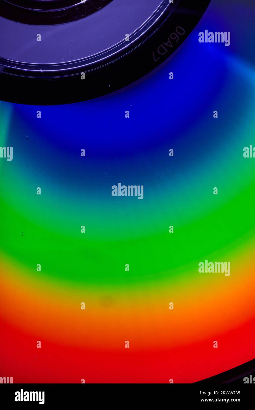 Curved metallic surface with solid rainbow colors and black upper ...