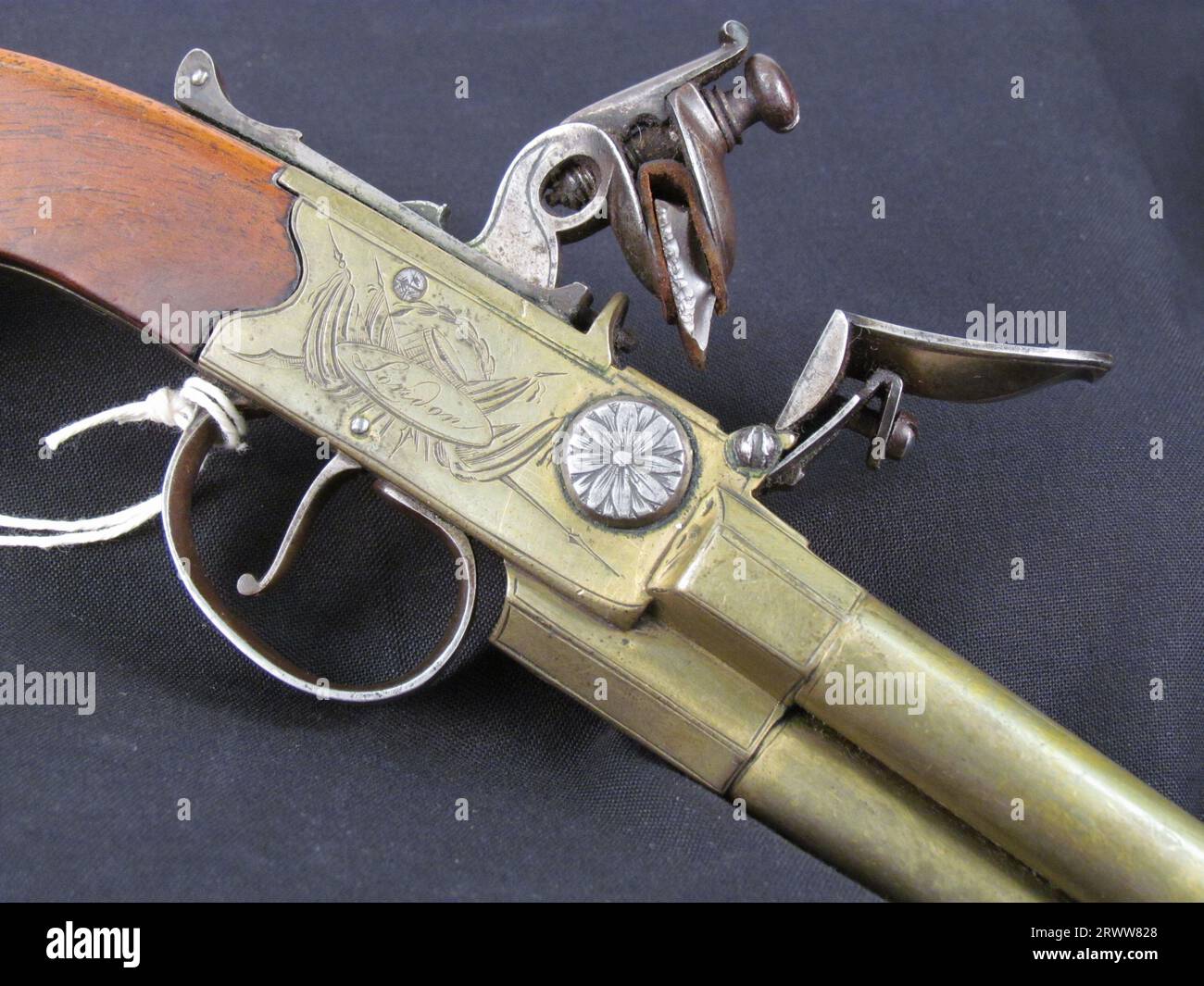 Three barrel flintlock boxlock pistol. AF*43540 Stock Photo - Alamy