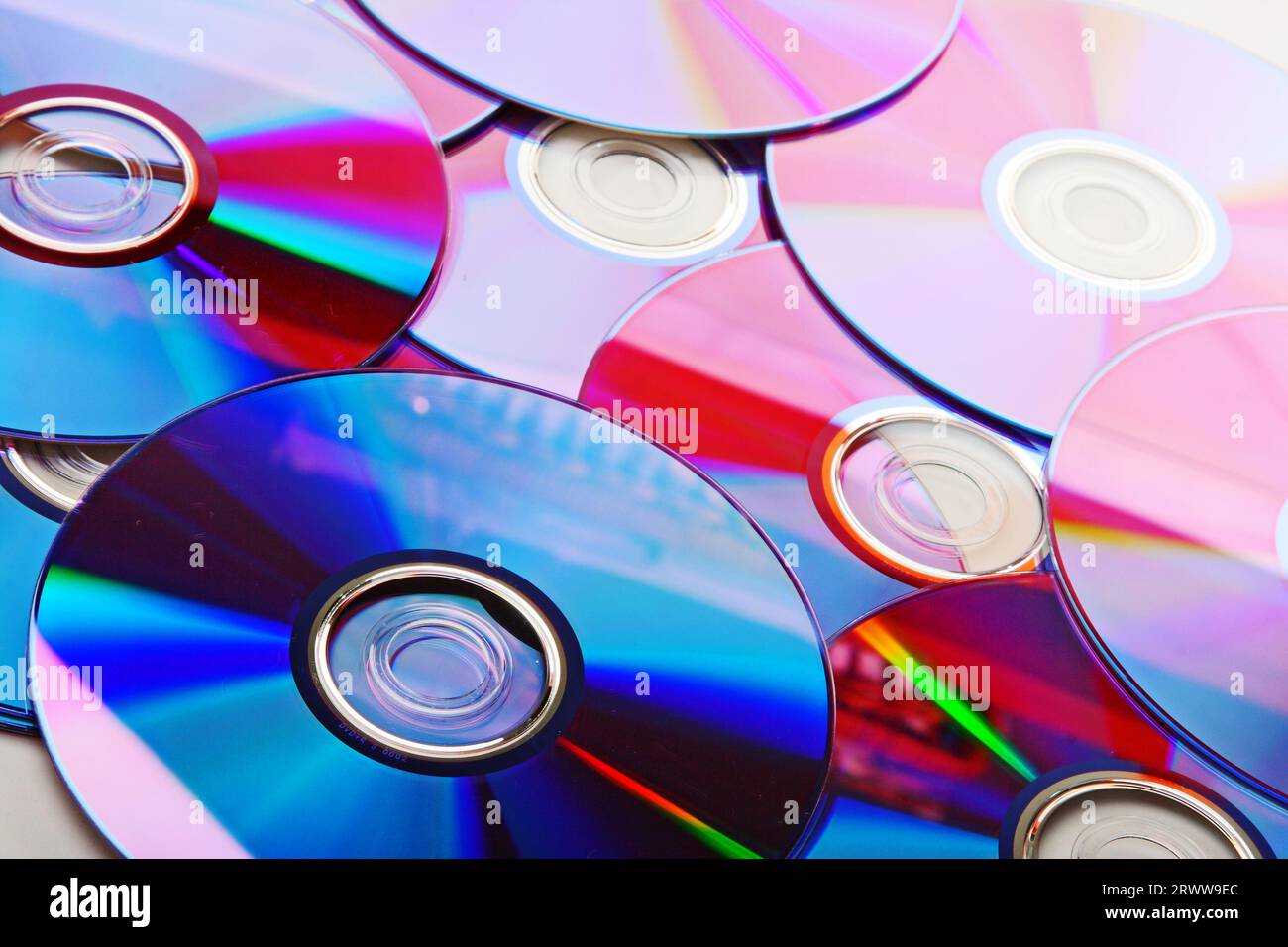 Many CD's isolated on the white background Stock Photo - Alamy