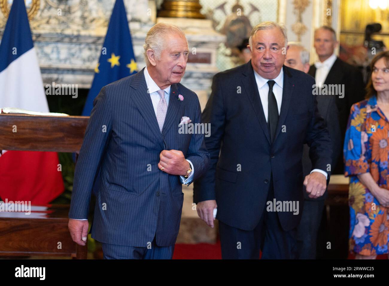 Britain King Charles III sign a golden book next to President of the ...