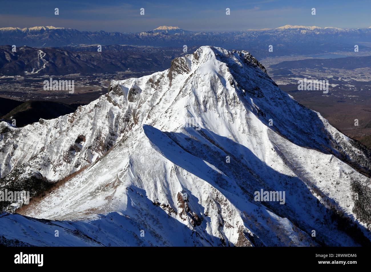 Mt. Amida in winter and the distant mountain range Stock Photo - Alamy