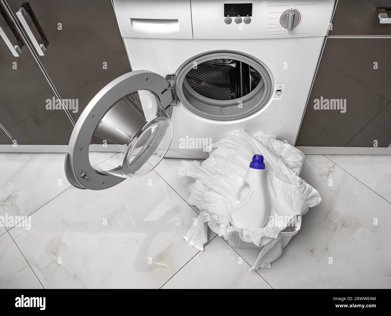 Woman basket clothes detergent table hi-res stock photography and images - Alamy