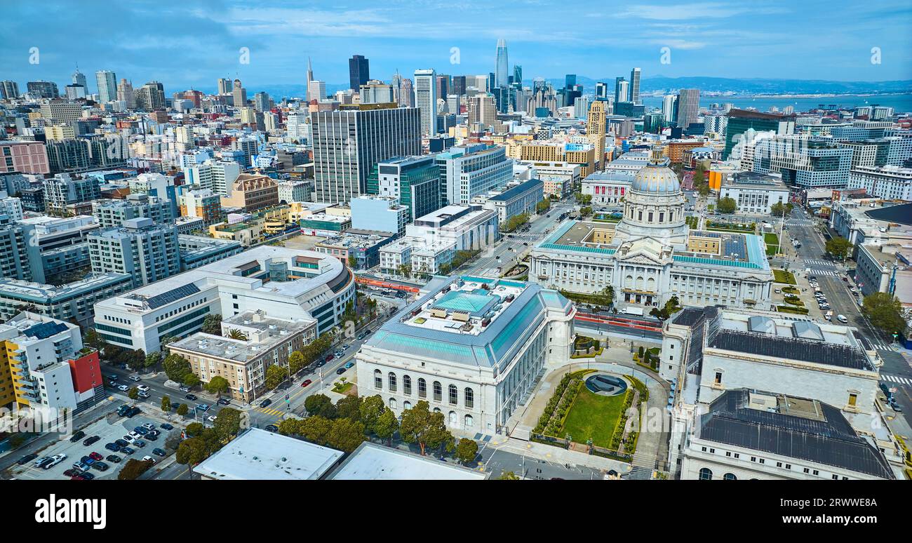 Aerial over city hall and veterans memorial with San Francisco ...