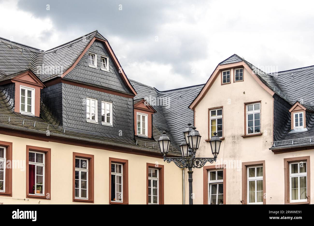 House facade with slate and traditional street lighting in weilburg ...