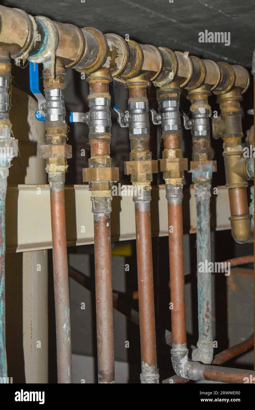 Sanitary installation: water pipes from the reserve tank Stock Photo ...