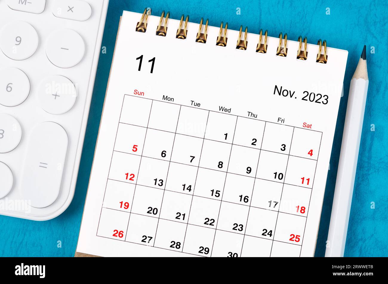 November 2023 Monthly desk calendar for 2023 year with calculator and ...