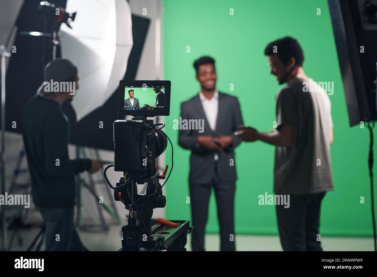 Professional camera of cameraman shooting the filming process of TV ...