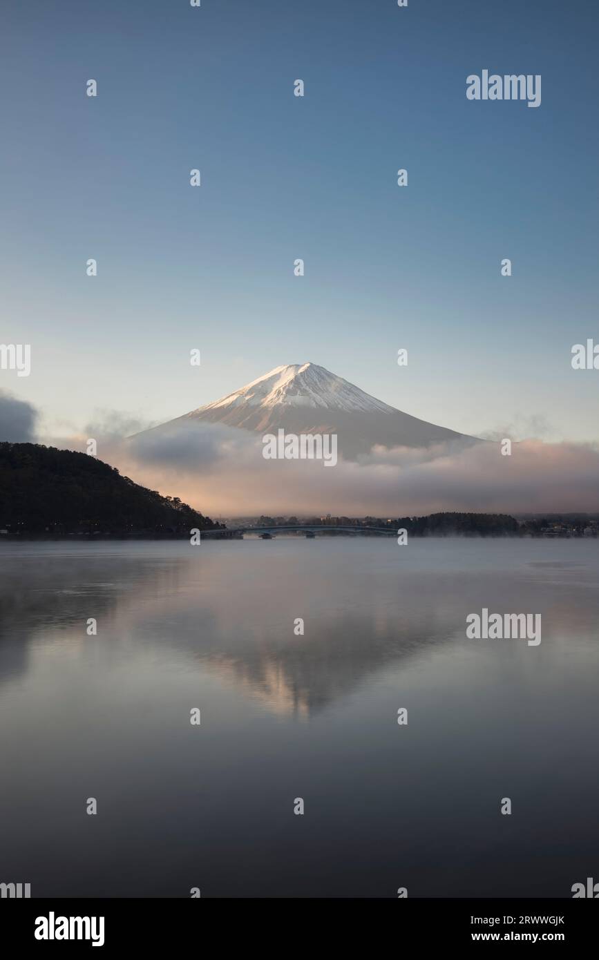 Mt. Fuji in the morning sun and upside-down Mt. Fuji seen from ...