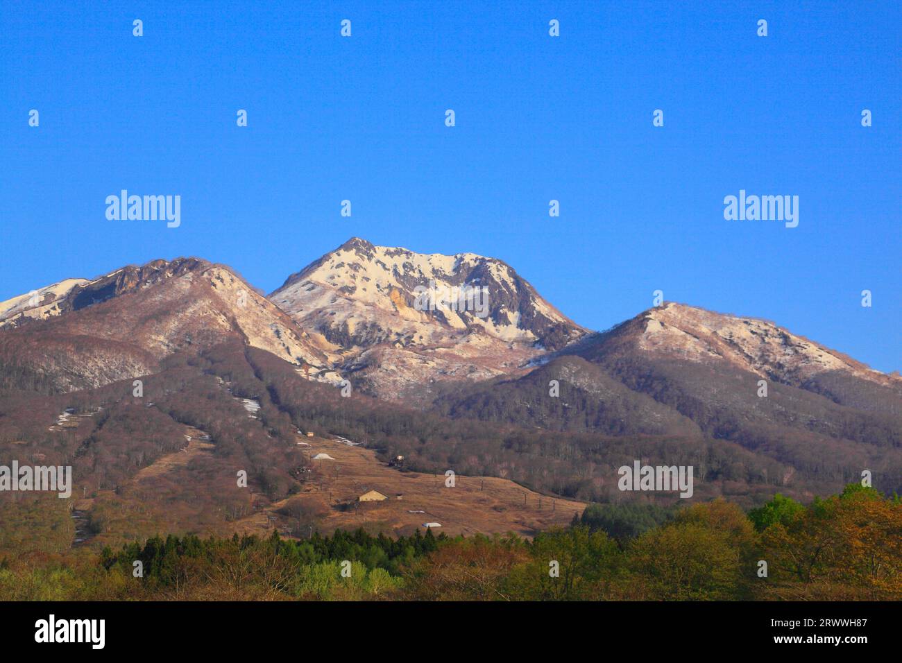 Mt. Myoko at morning glow seen from Imori-ike Pond in Myoko Plateau ...