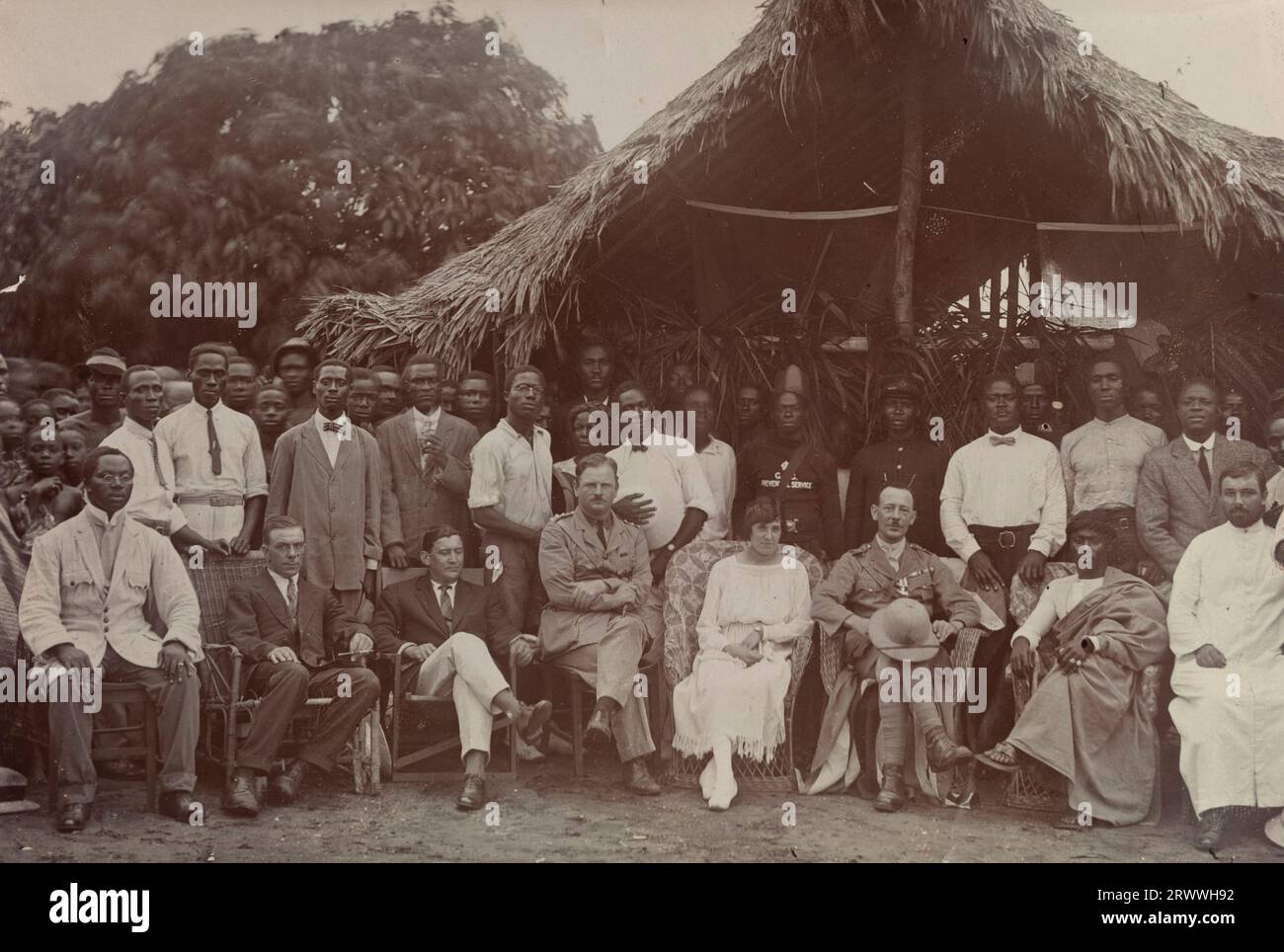 A large group of European and African people gather for a photograph ...