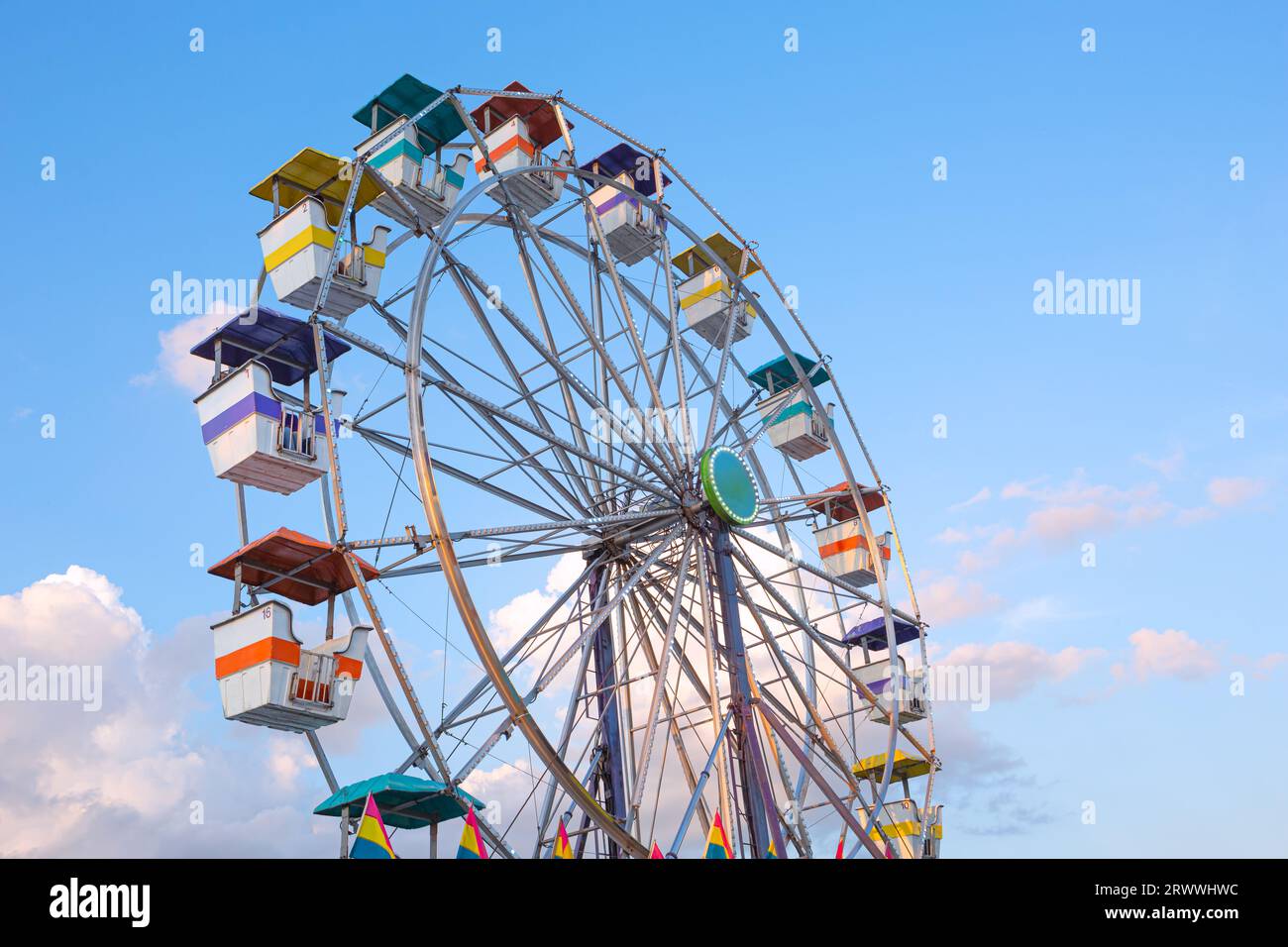 Colorful ferris wheel at a local county fair Stock Photo - Alamy