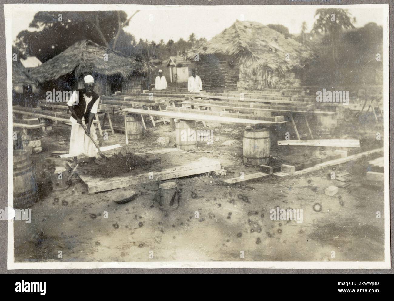 A single funnelled steamship in port. View across the water with 4 ...