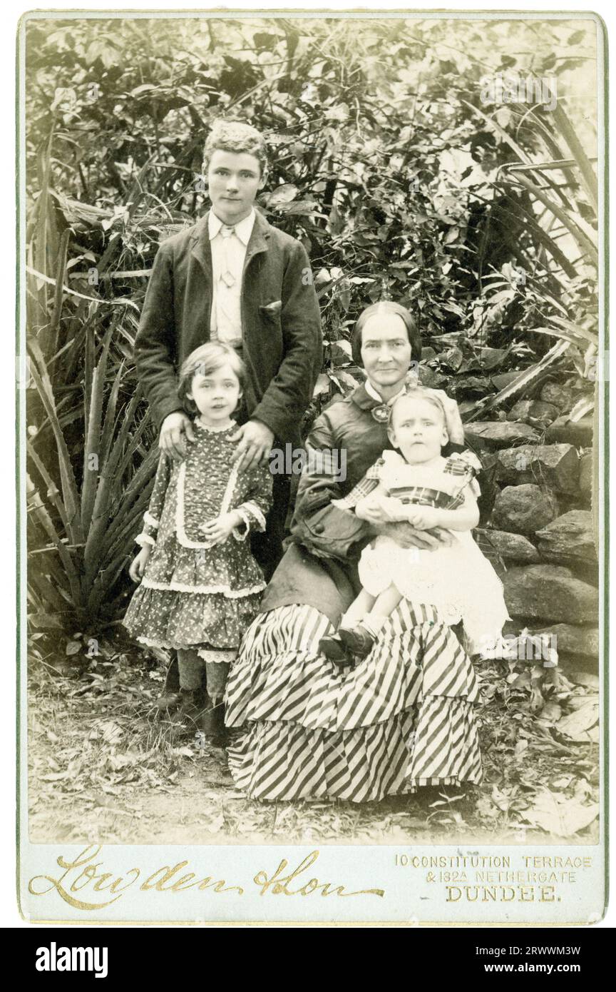 Group portrait of Amelia Anderson (John Small's mother-in-law) seated ...