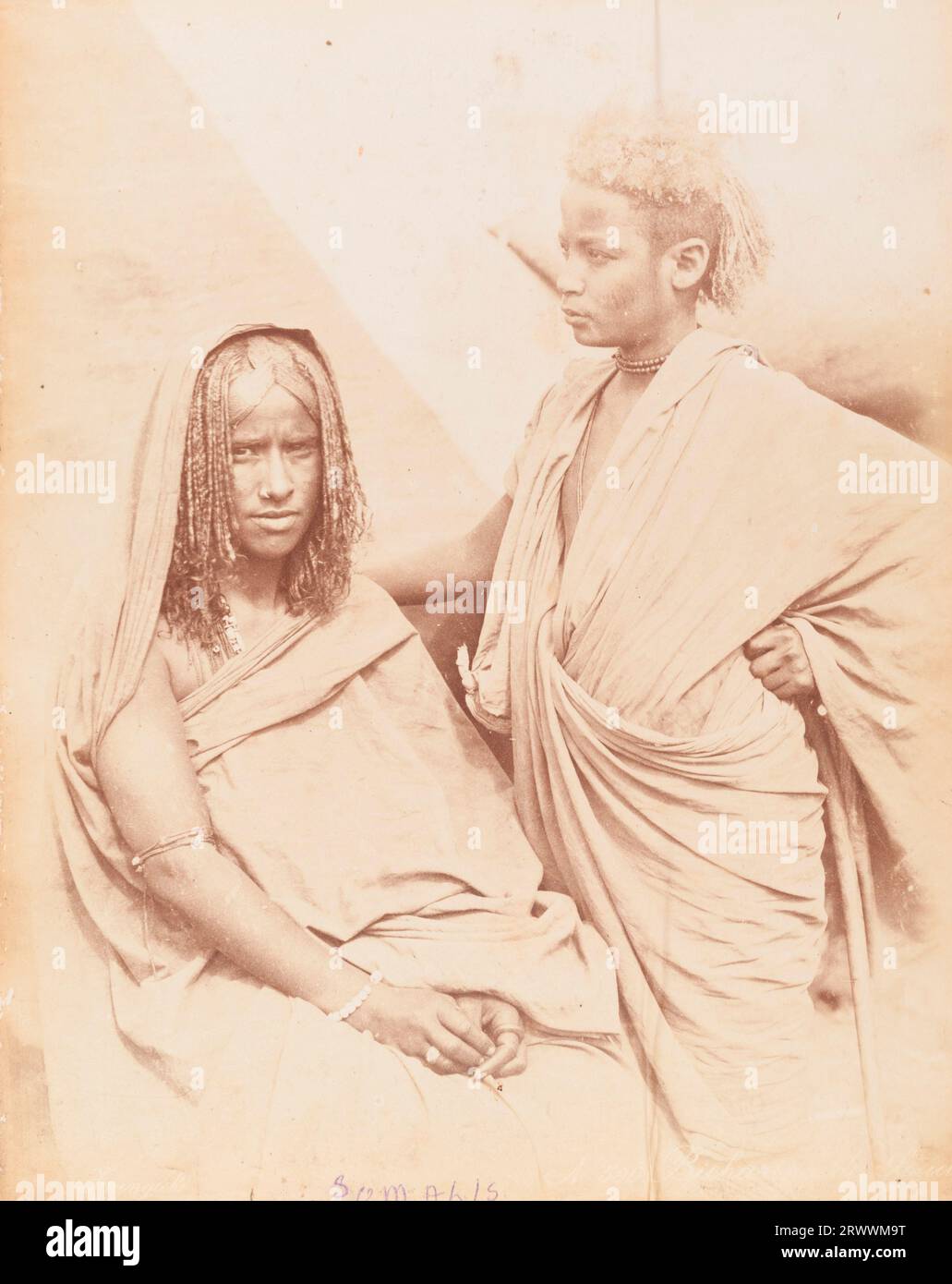 Portrait of a Bicharin woman and young boy indigenous to the Beja. They ...