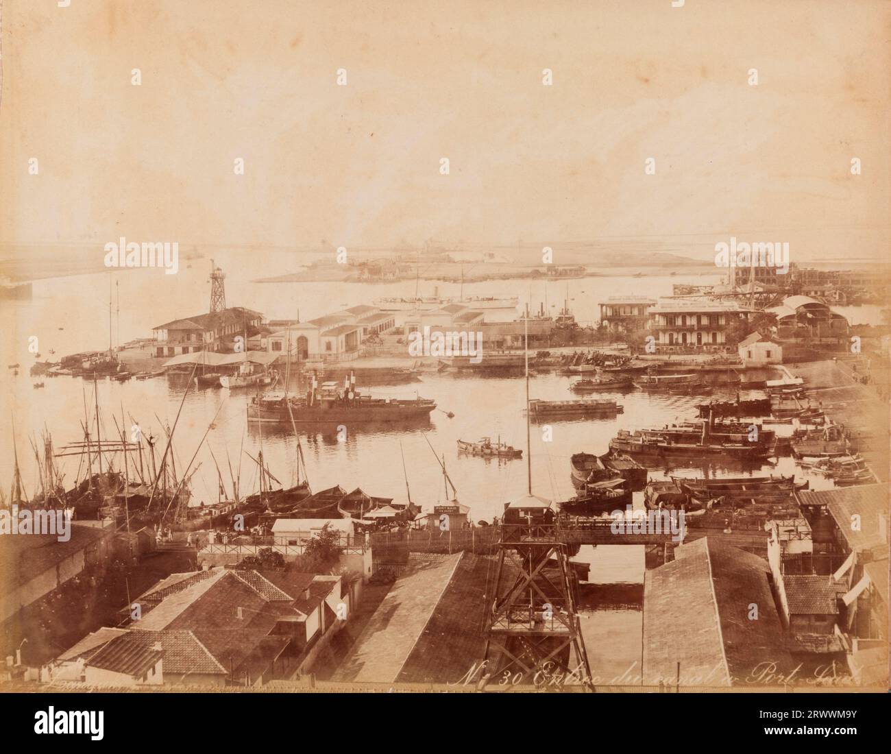 View of Port Said showing several boats and ships anchored in the canal ...