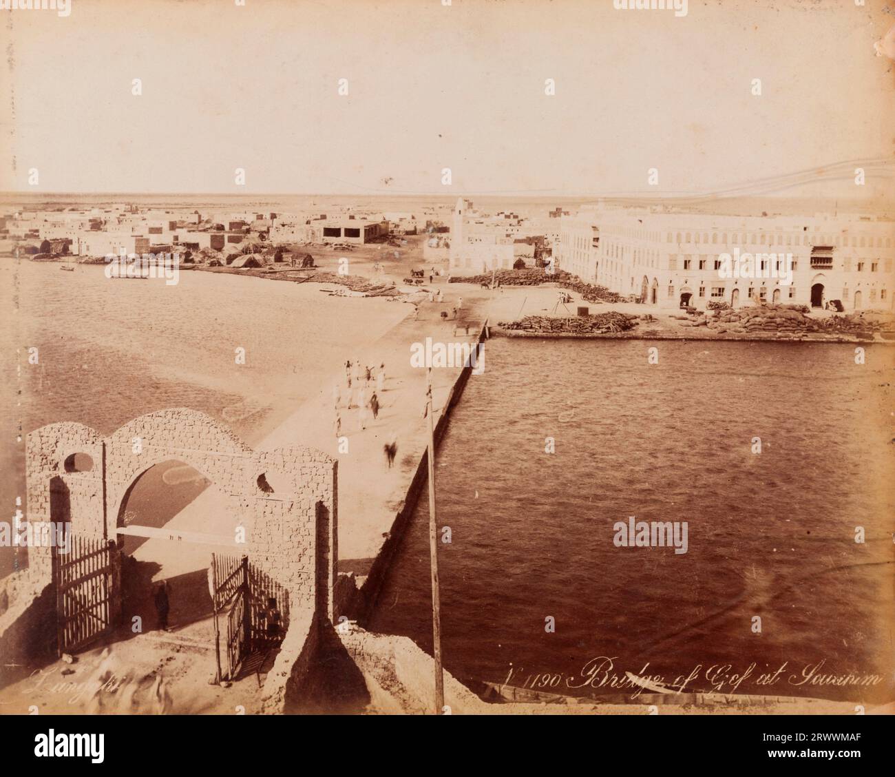 View of the bridged walkway at Suakim (Suakin) Seaport. Several ...