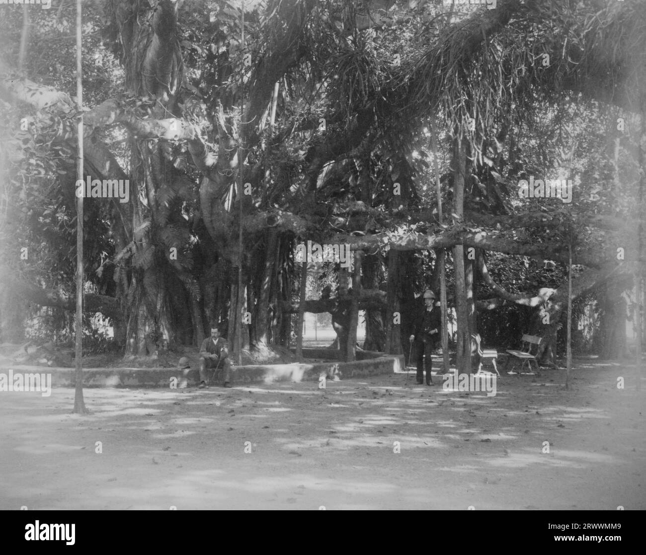 Two men walking one Black and White Stock Photos & Images - Alamy