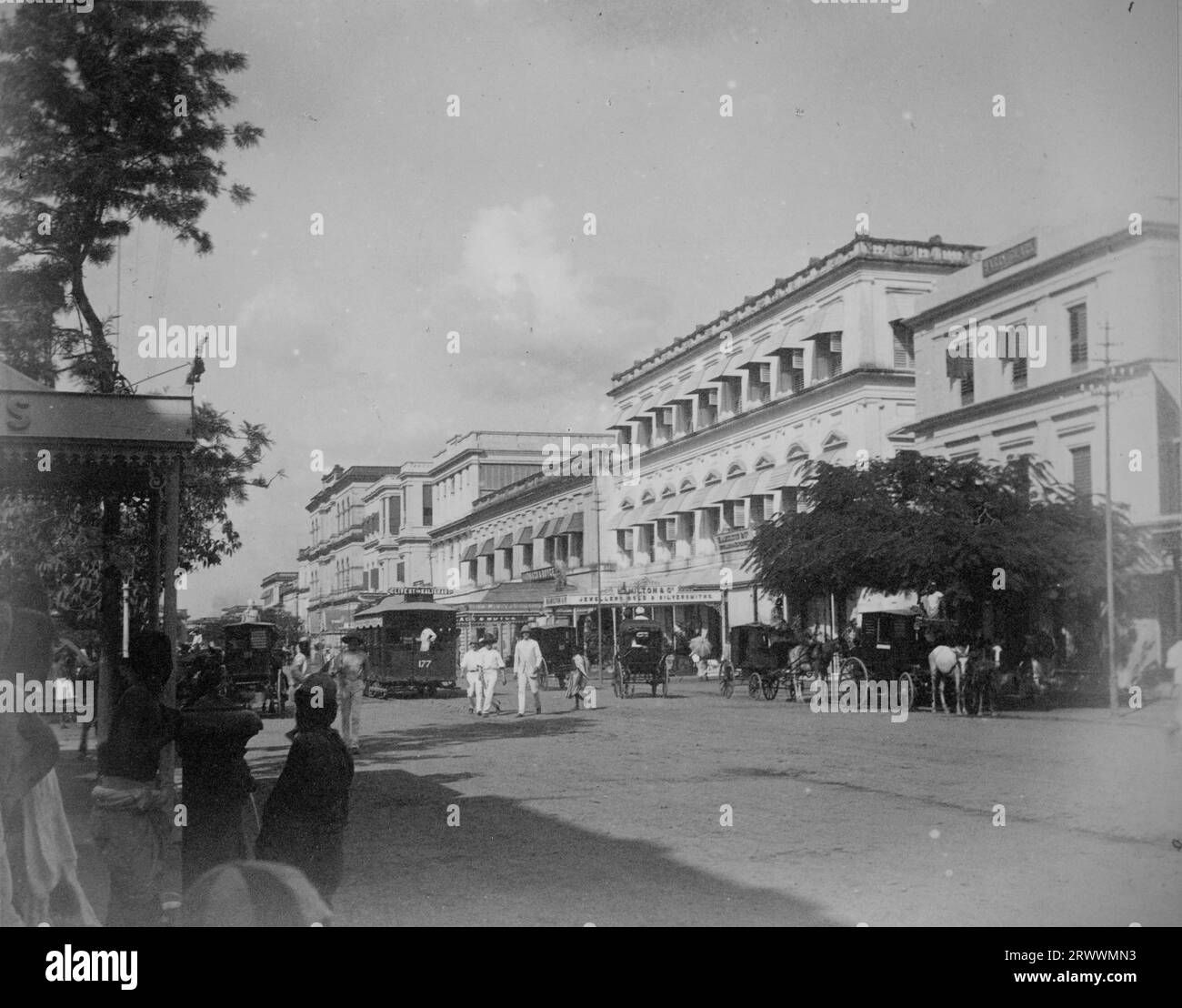 Street scene lined with colonial buildings. European and Indian ...