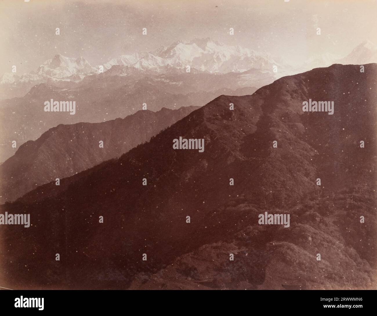 View of Himalayan mountain range with rocky terrain in the foreground ...
