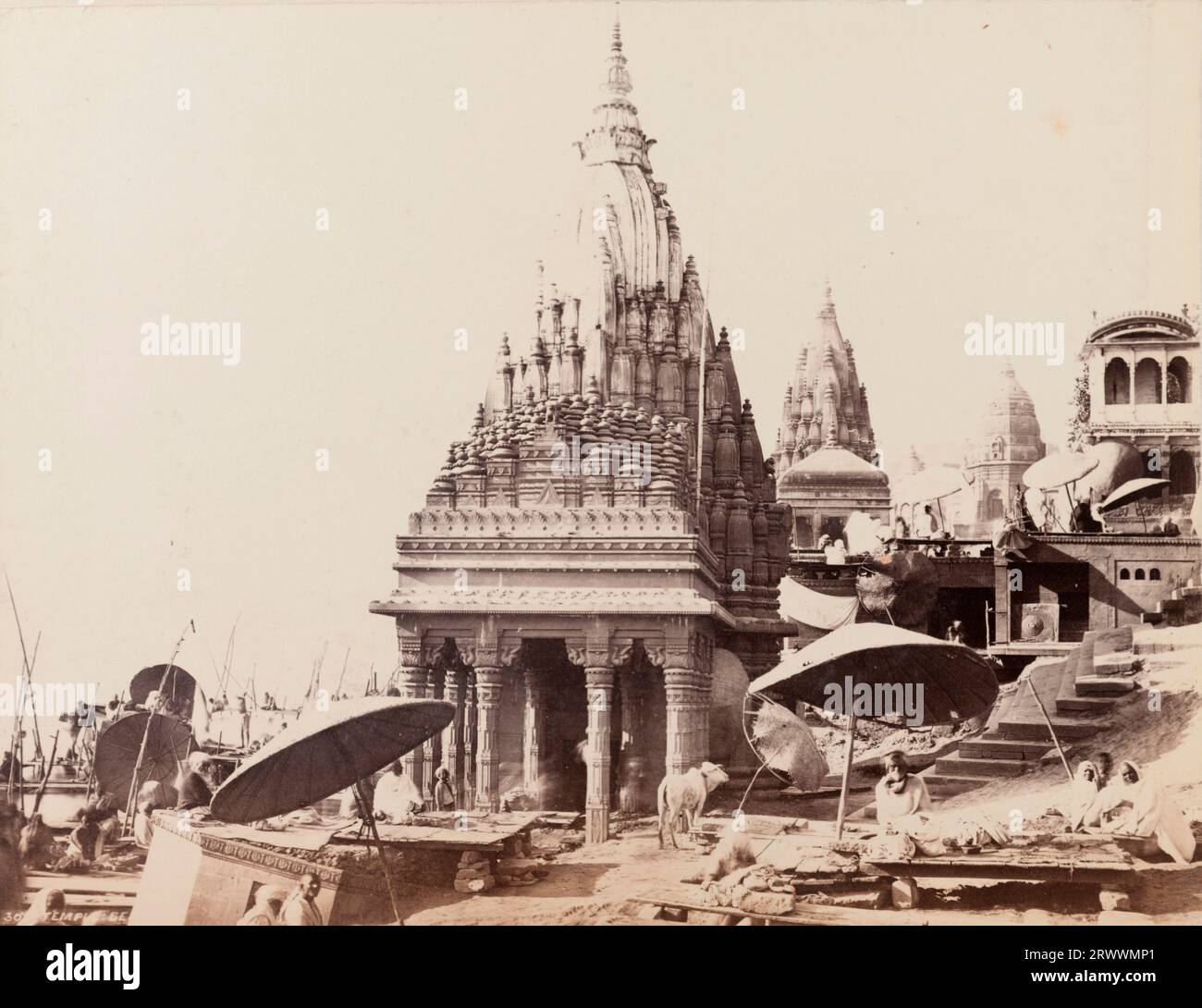 View of the Hindu temples down the steps from the Manikarnika Ghat near ...