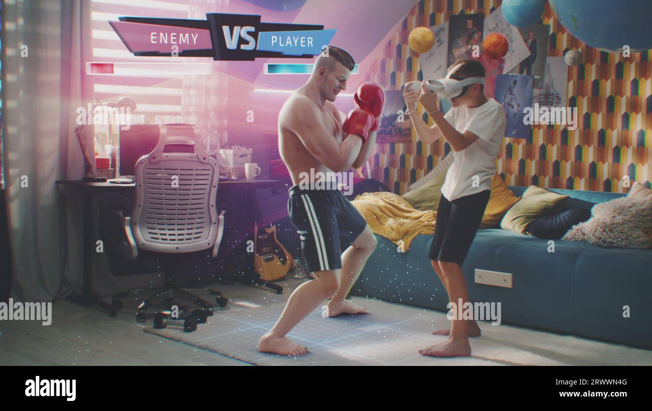 Boy in VR headset plays online augmented reality video game at home ...