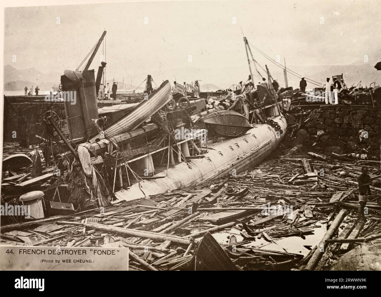 The wreckage of a French naval destroyer lies in a tangled heap on the ...