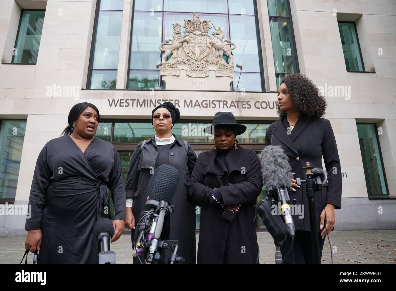 Members of campaign group Justice For Chris Kaba give a statement ...