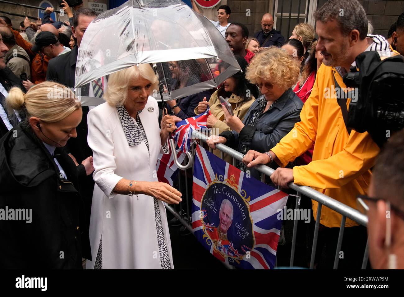 Britain's Queen Camilla meets residents after visiting the Flower ...