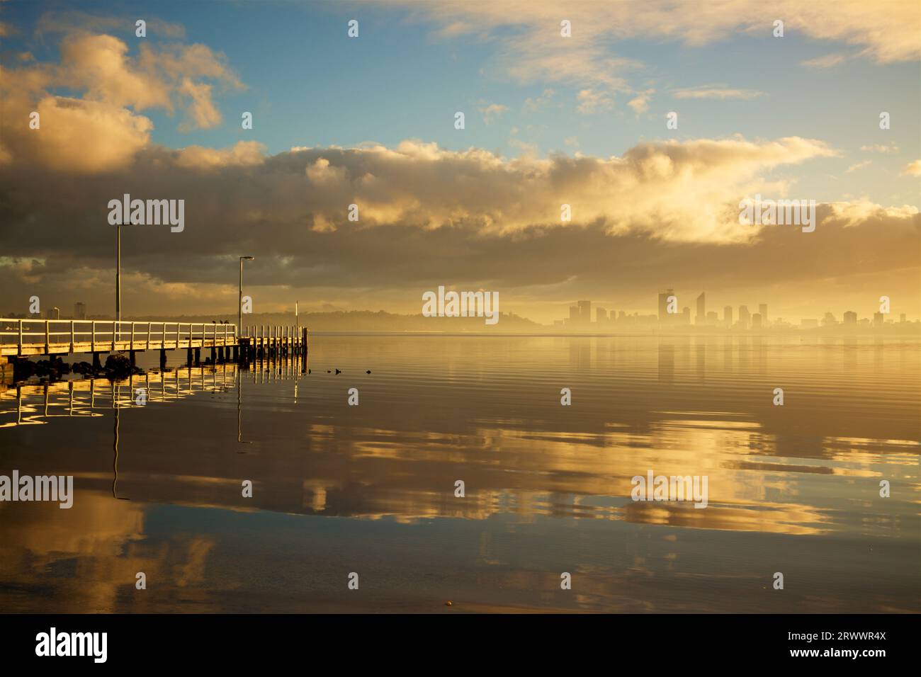 Sunrise at the Applecross foreshore and jetty with sky and cloud ...