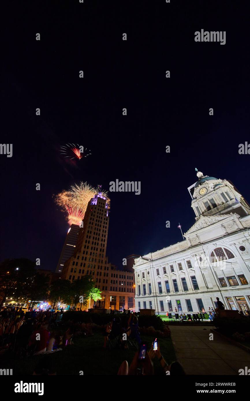 Fireworks in downtown Fort Wayne with courthouse and crowd of people ...