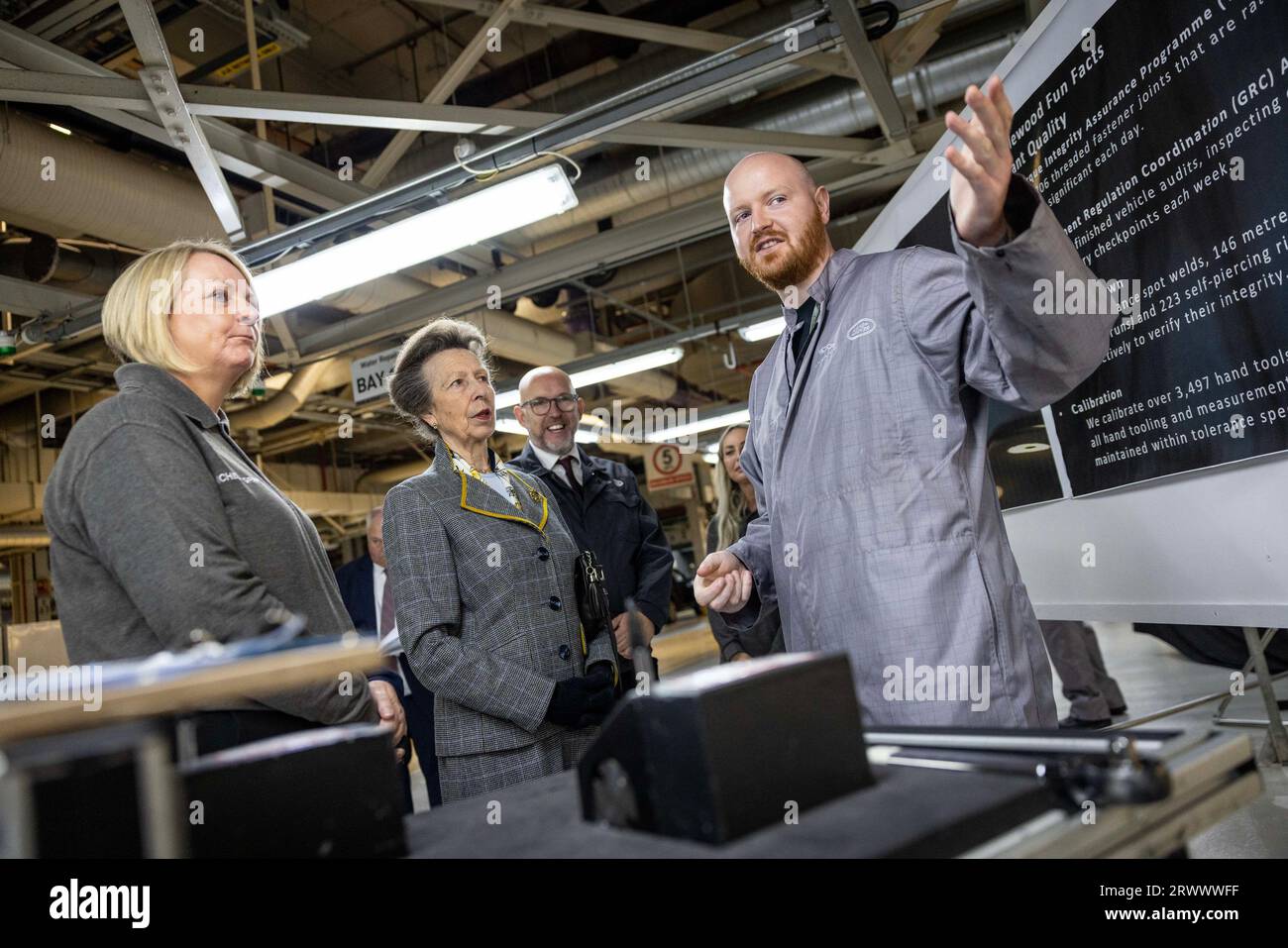 EDITORIAL USE ONLY The Princess Royal (2nd left) meets employees during ...