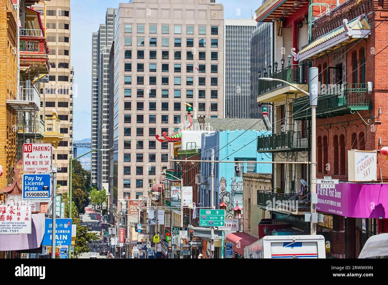 Chinatown street view from atop hill looking at street signs along with ...