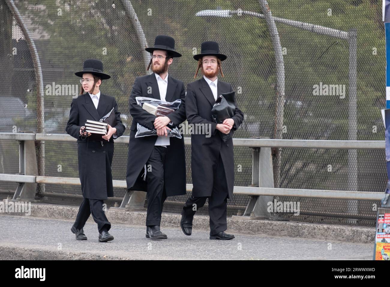 3 orthodox Jewish men likely brothers return from temple. On the Lee ...
