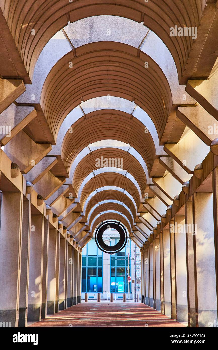 Optical illusion tunnel ceiling with black circular opening at the end ...