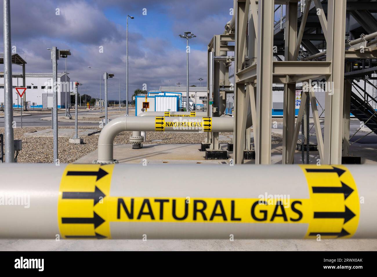 Natural gas main high pressure pipeline with yellow label Stock Photo ...