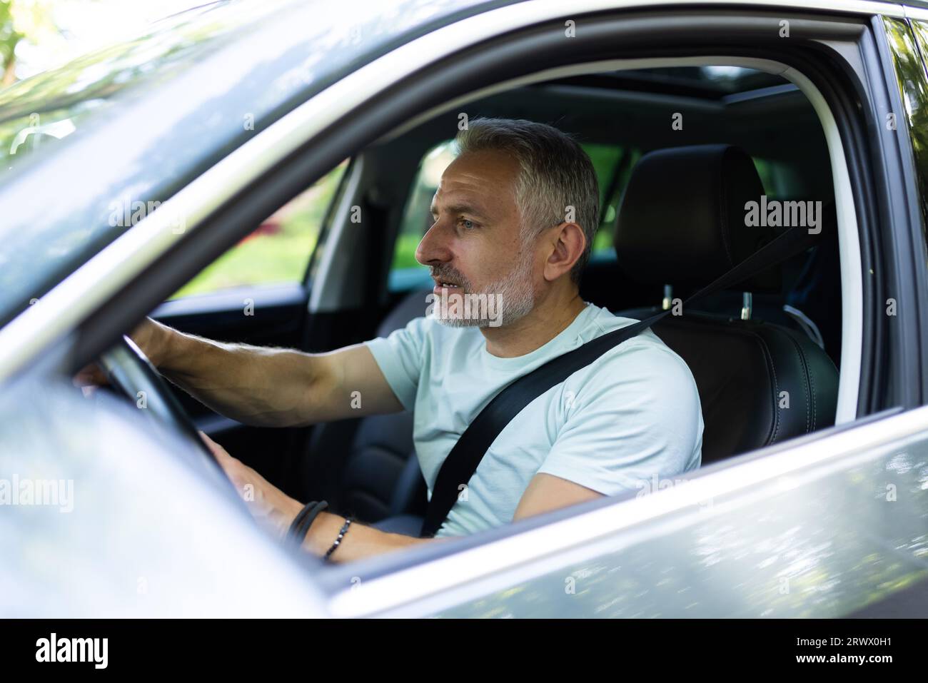 Angry and nervous truck driver yelling at someone in traffic Stock ...