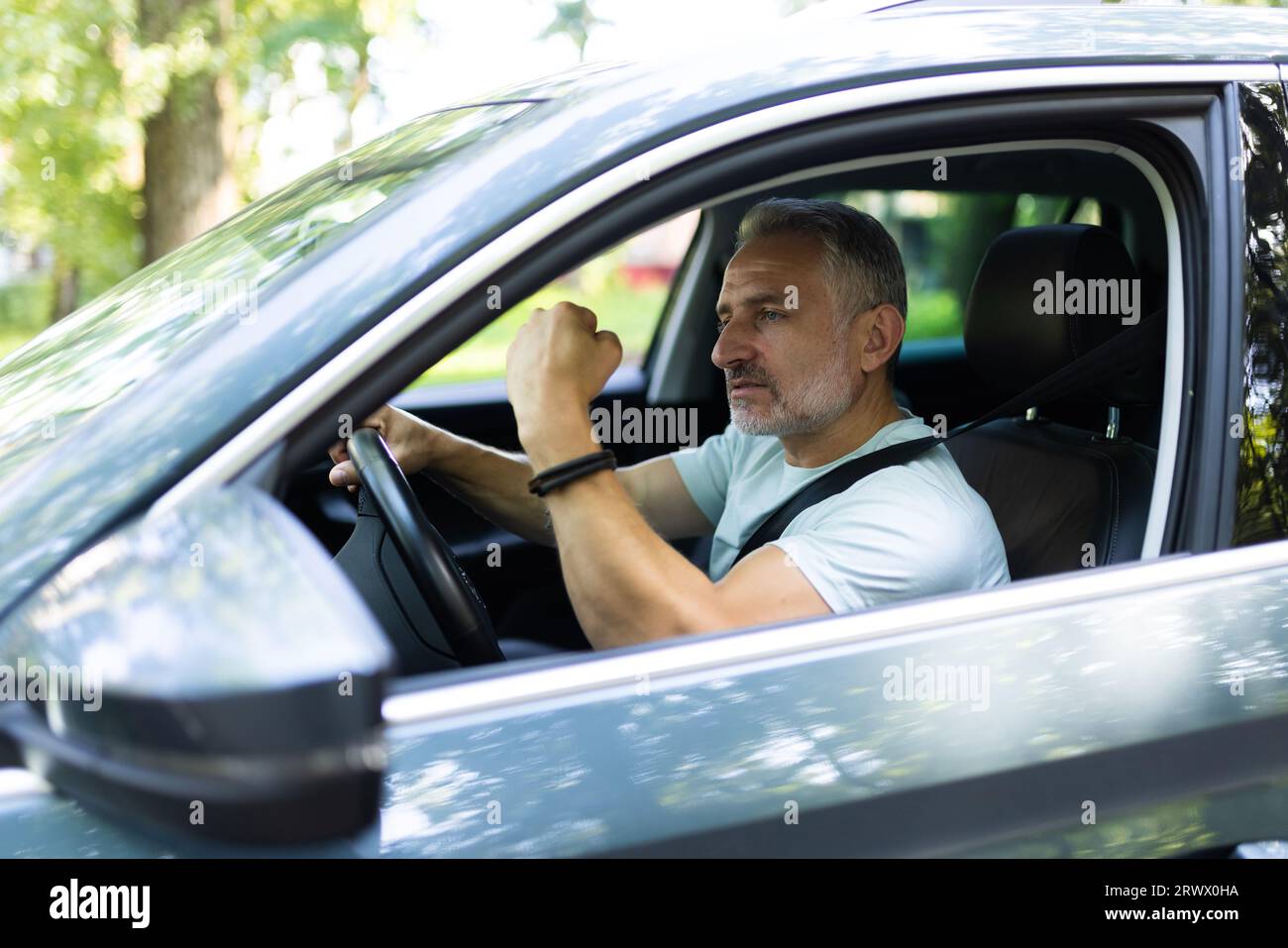 Angry and nervous truck driver yelling at someone in traffic Stock ...